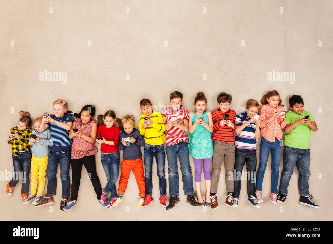 Children using mobile phones Stock Photo - Alamy