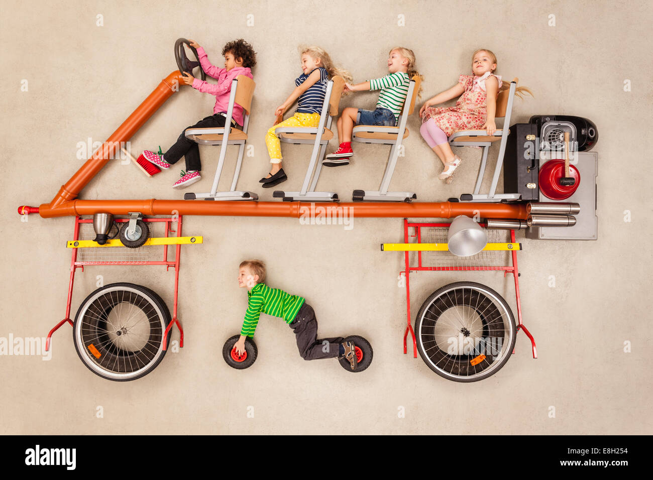 Children driving bus Stock Photo - Alamy