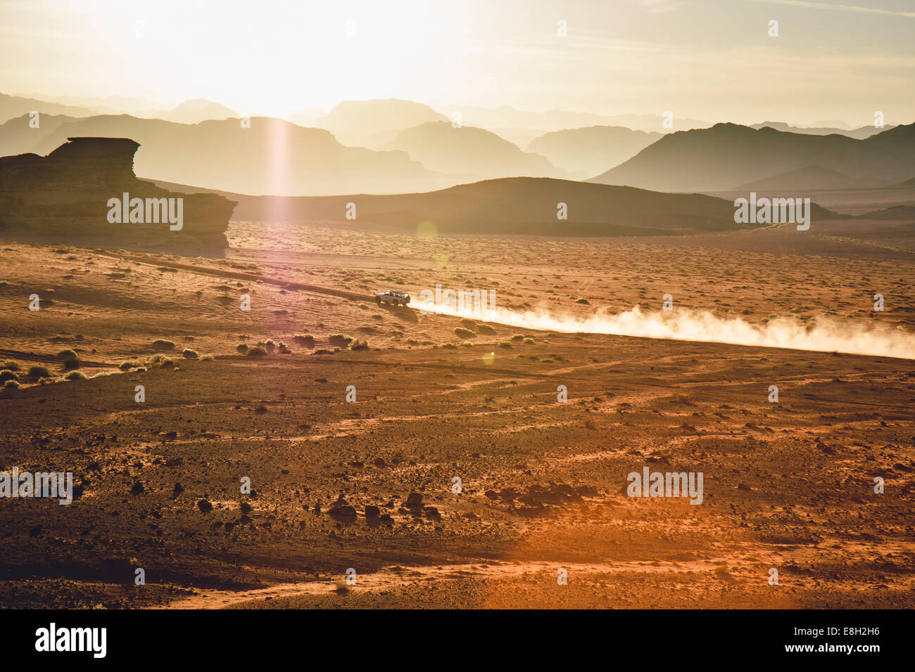 Jordan, Sand dust from a 4-wheeler in Wadi Rum desert Stock Photo - Alamy