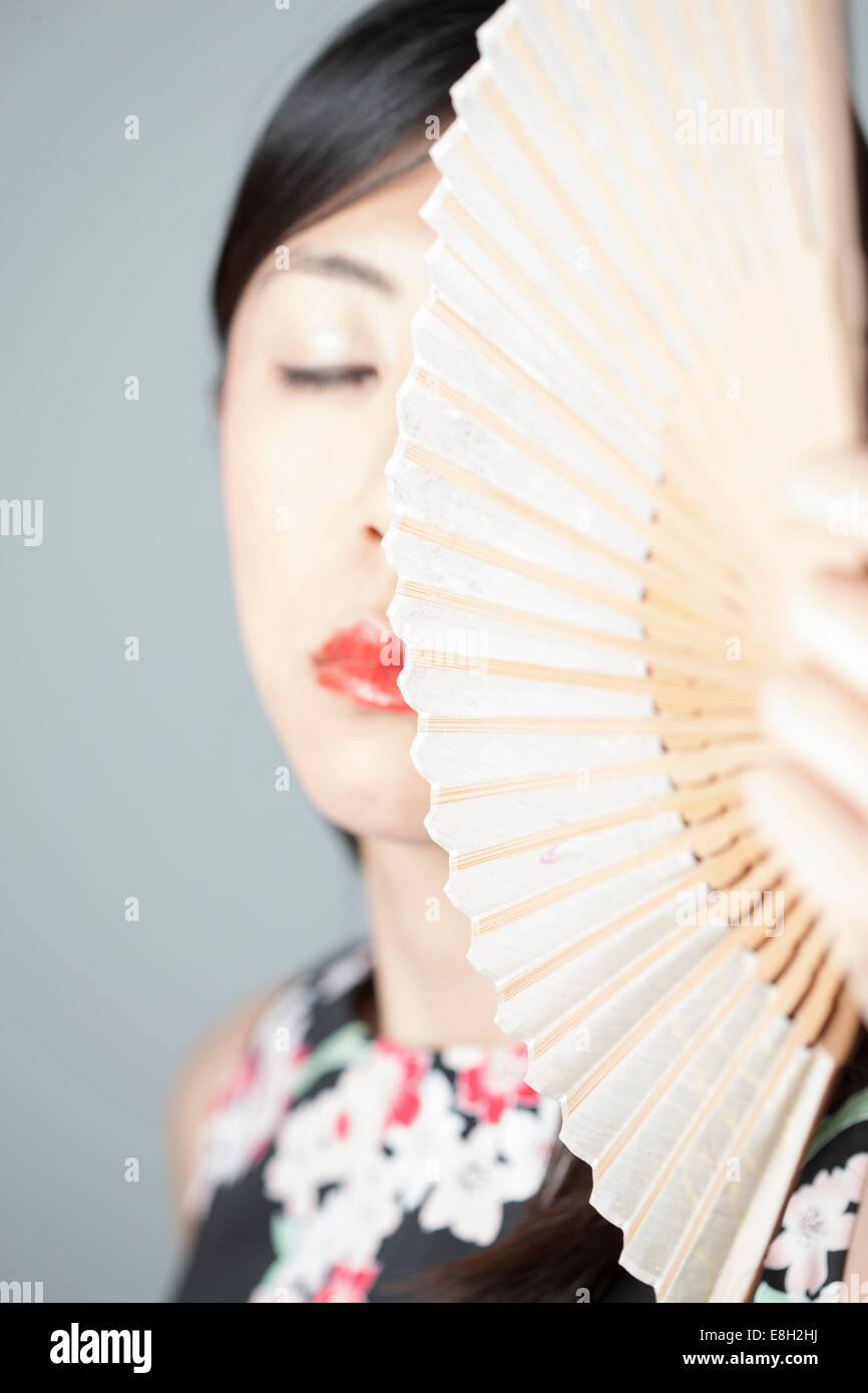 Holding closed fan hi-res stock photography and images - Alamy