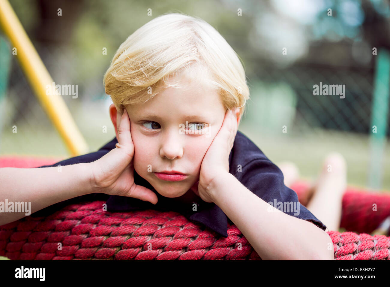 Defiant facial expression hi-res stock photography and images - Alamy