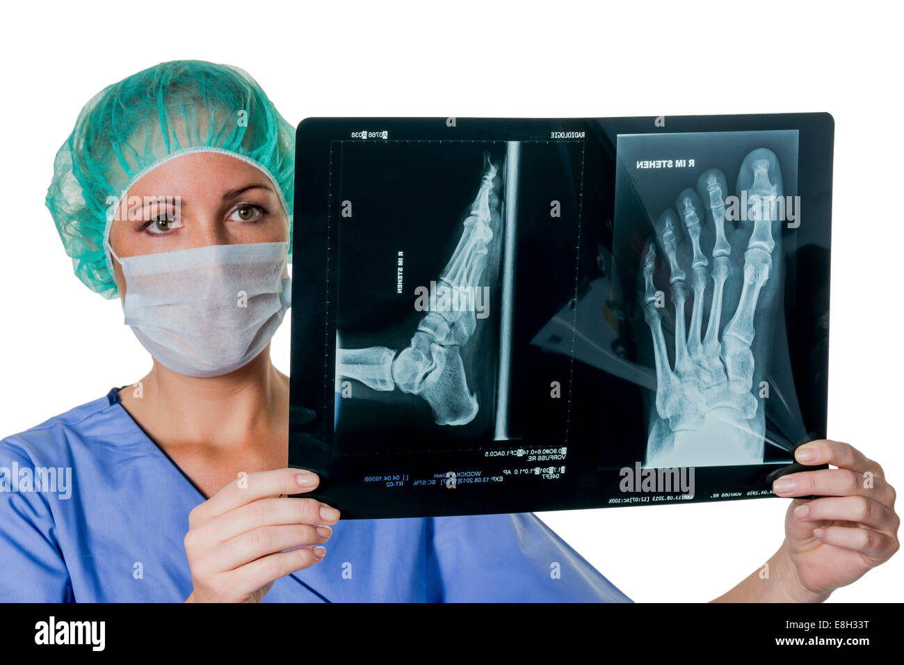 Doctor looking at x-ray of foot Stock Photo - Alamy