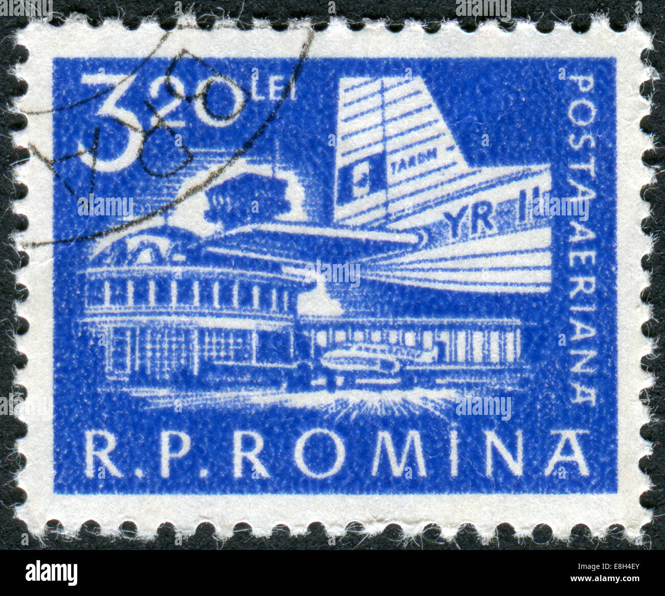 Postage stamp printed in Romania shows Airplane at Bucharest Airport ...