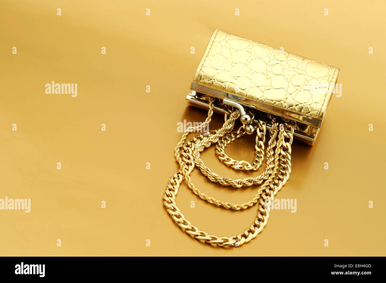 Gold purse hi-res stock photography and images - Alamy