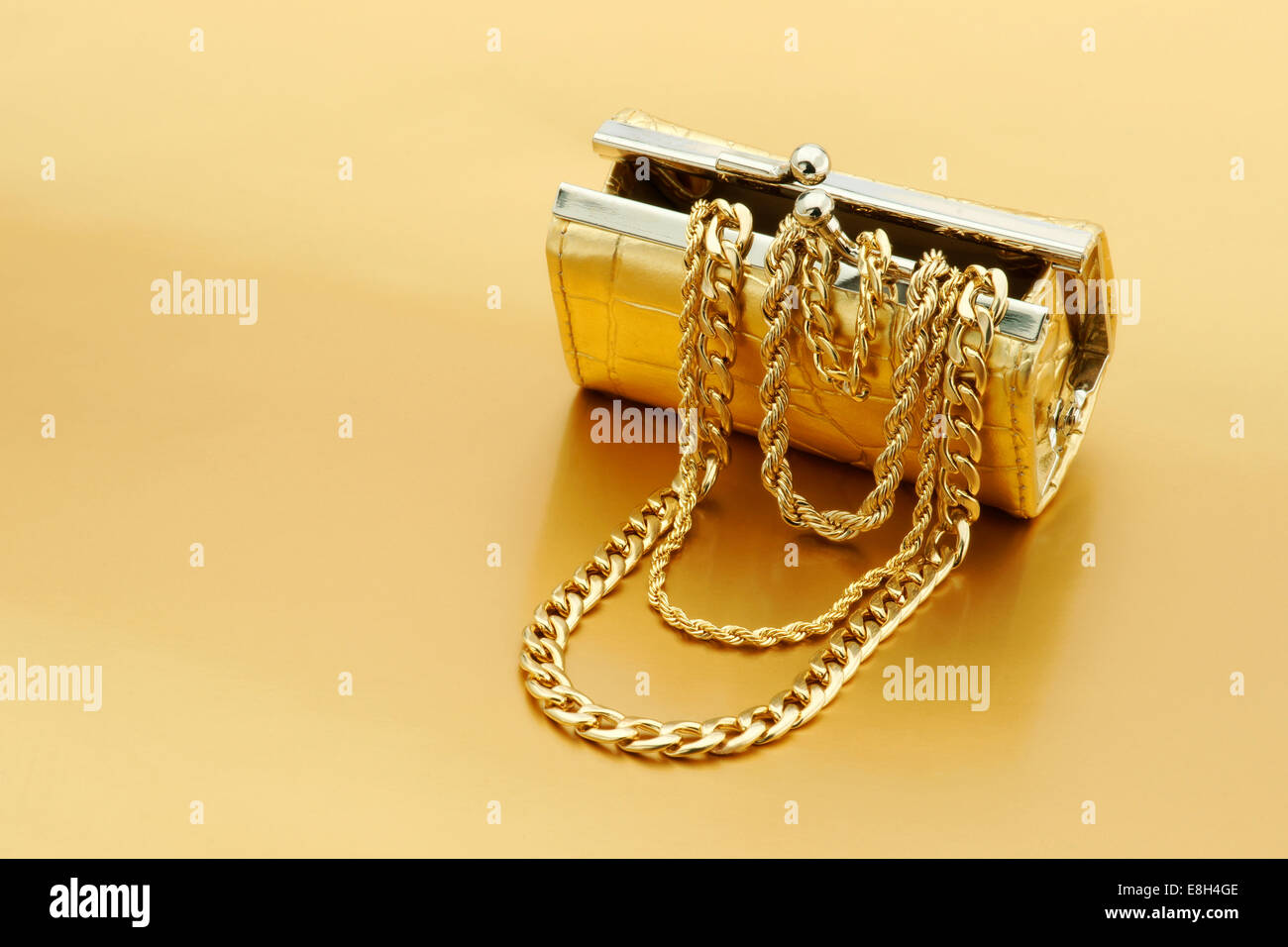 Gold purse hi-res stock photography and images - Alamy
