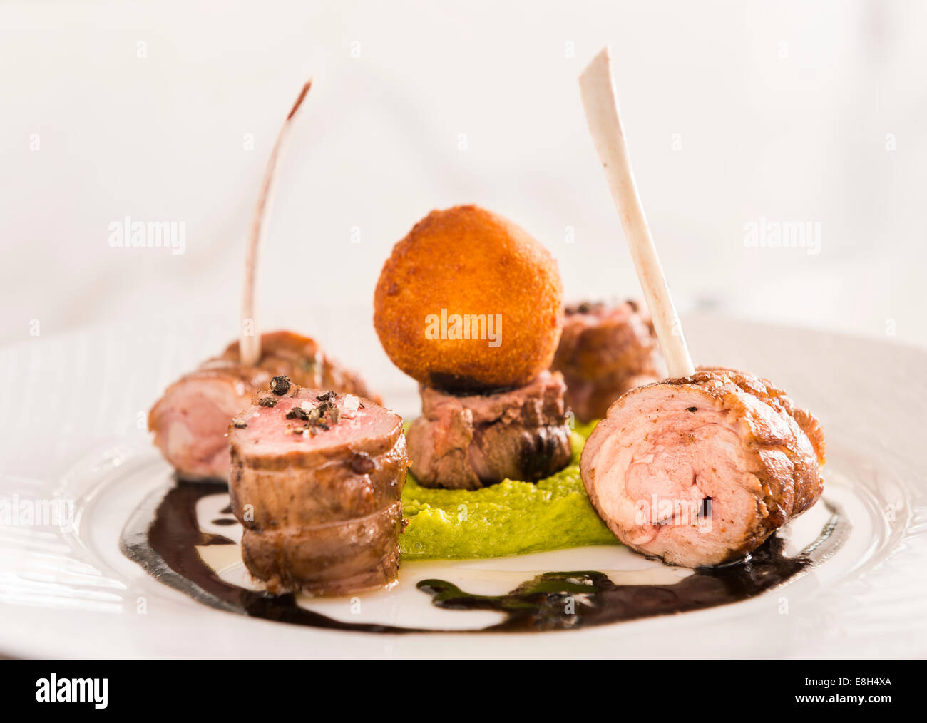 Haute Cuisine, Pork roulade, Spare ribs, Pea puree, Potato croquette ...