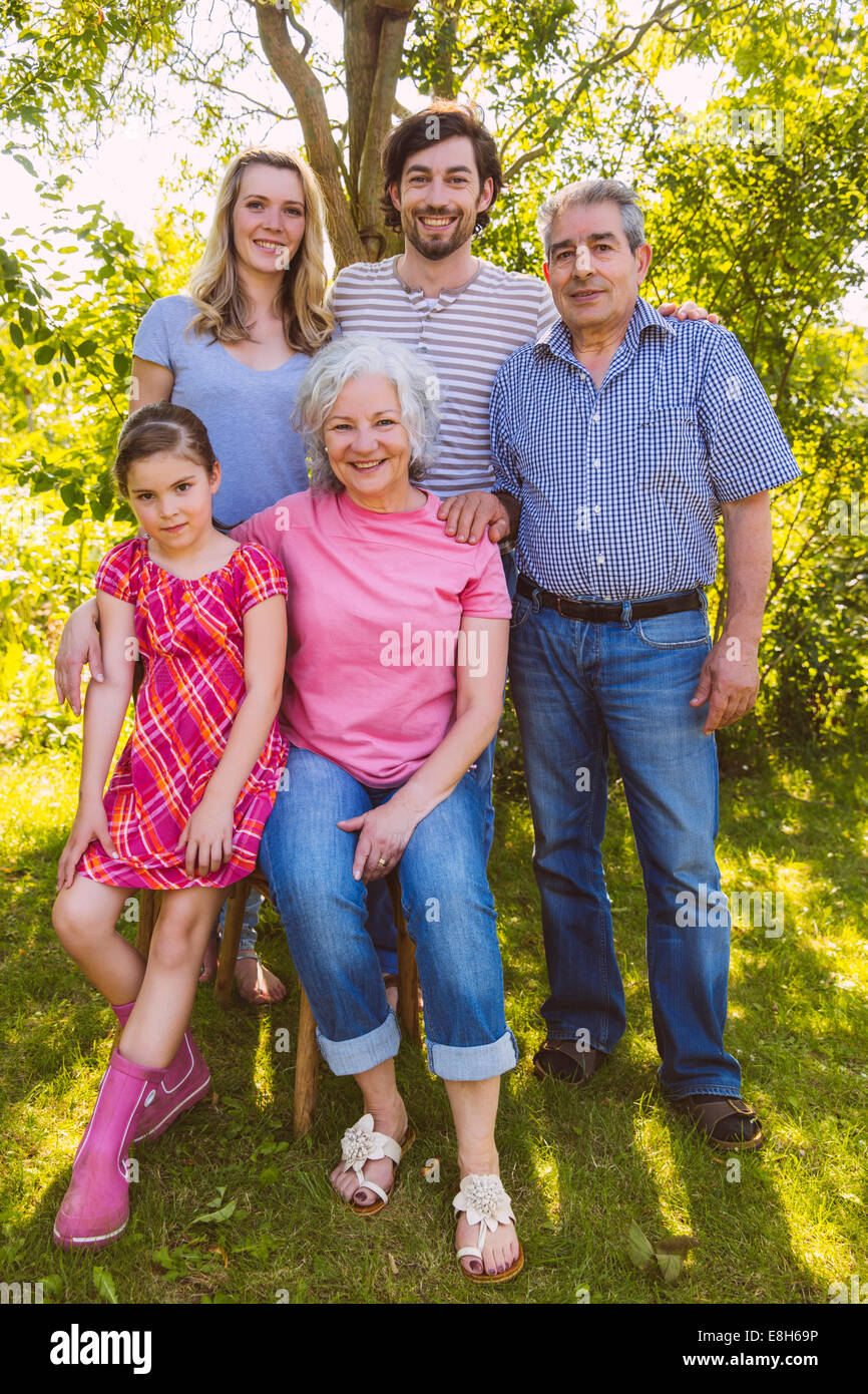 Portrait of three generation family in garden Stock Photo - Alamy
