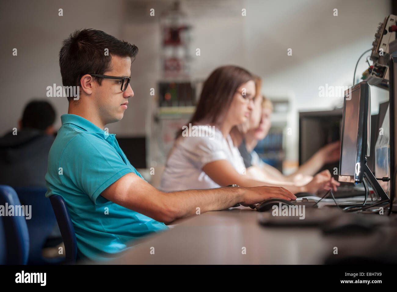 Computer lab students monitor hi-res stock photography and images - Alamy