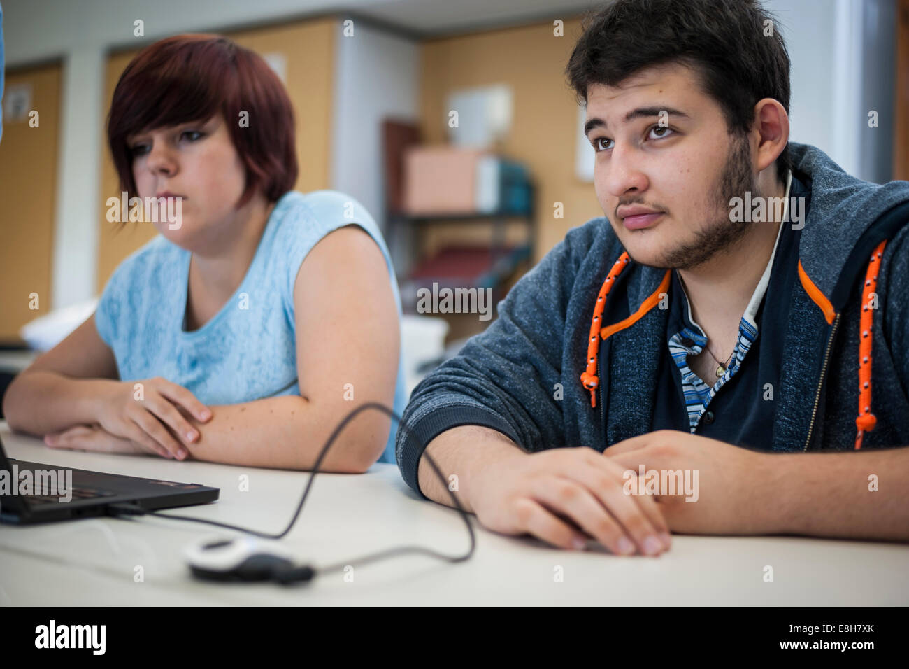 Two vocational school students in class room Stock Photo - Alamy