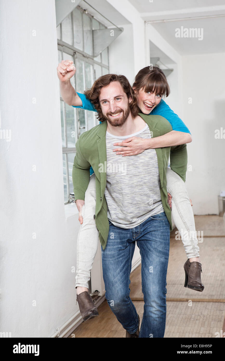 Two colleagues having fun in the office Stock Photo - Alamy