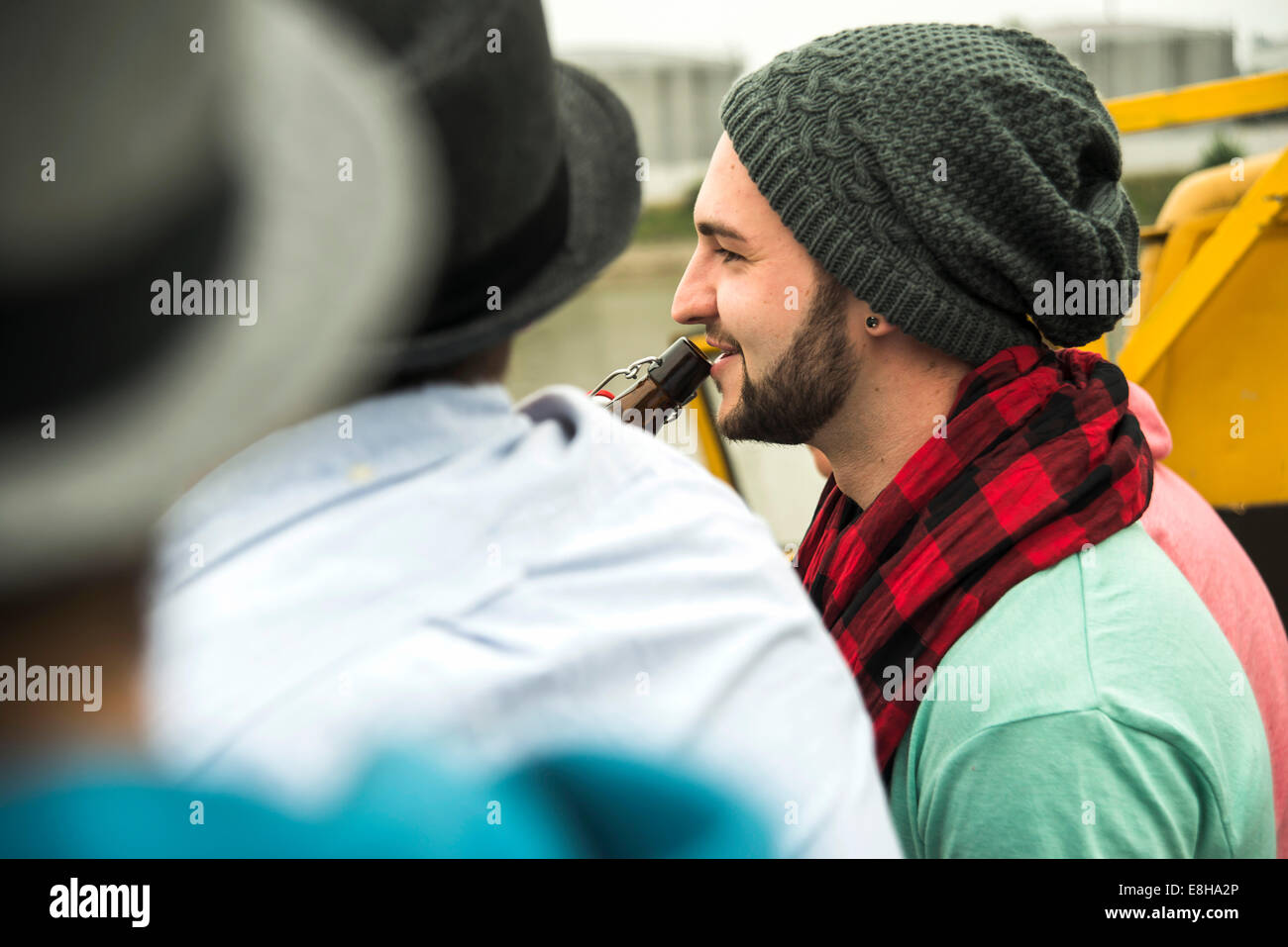 Group of friends drinking beer outdoors Stock Photo - Alamy