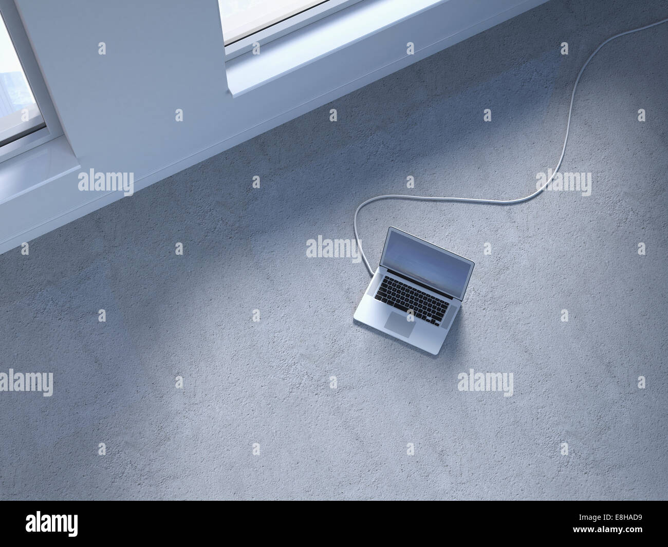 Wired laptop on concrete floor, 3D Rendering Stock Photo - Alamy