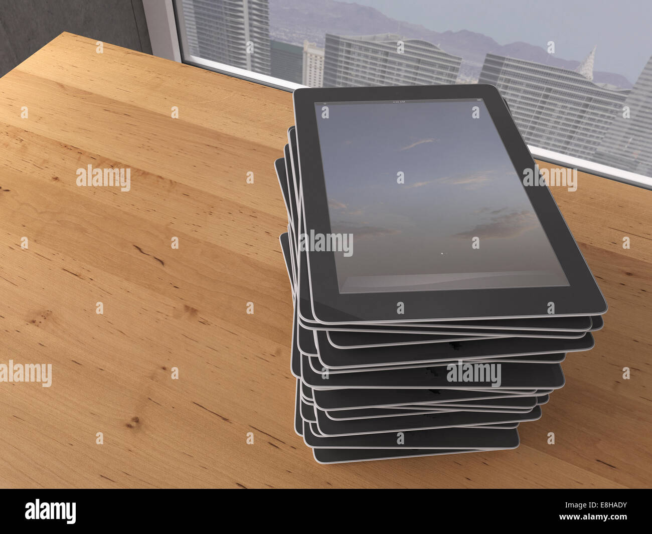 Table with stack of digital tablets hi-res stock photography and images ...