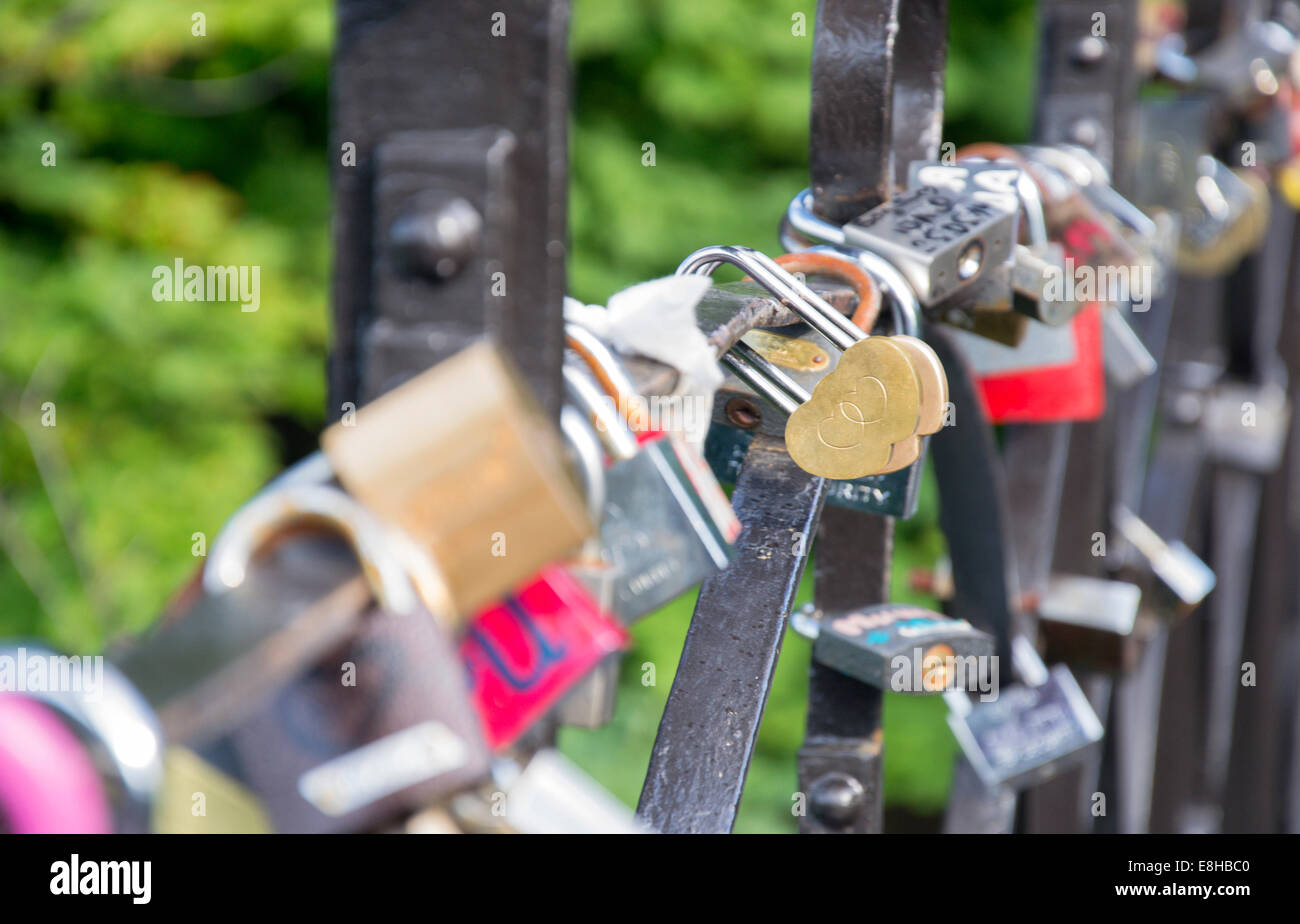 Locks of love, hanging on the railing of the bridge Stock Photo - Alamy
