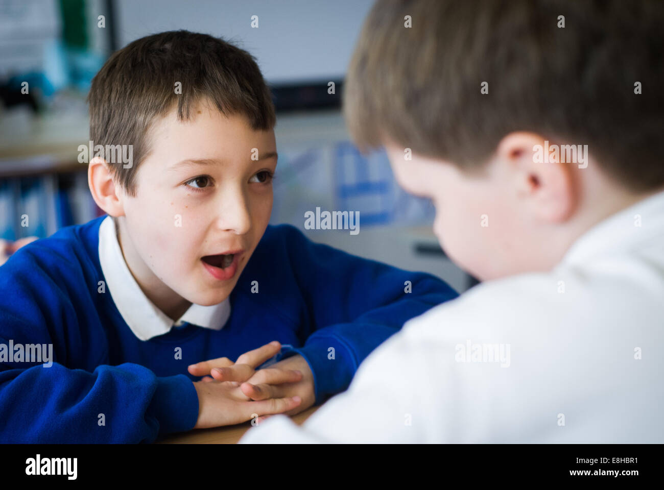Kids talking classroom hi-res stock photography and images - Alamy