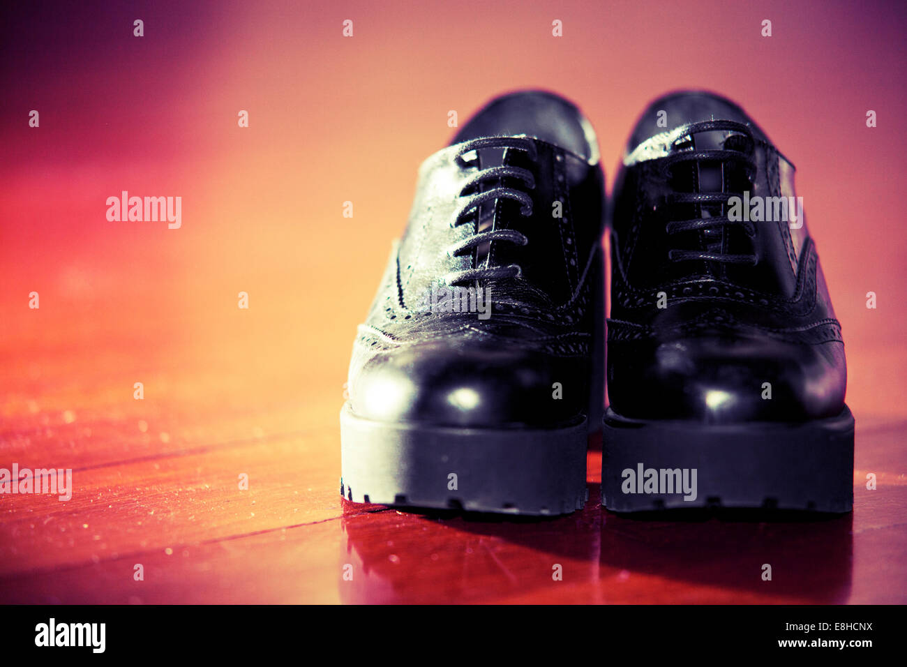 Black leather college shoes with high heavy sole Stock Photo - Alamy