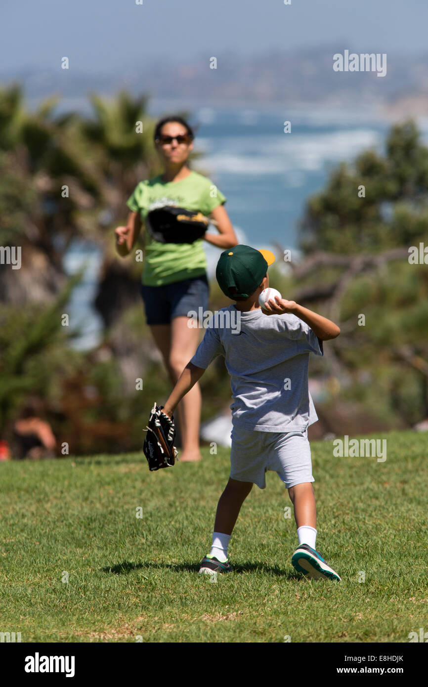 Boy playing catch hi-res stock photography and images - Alamy