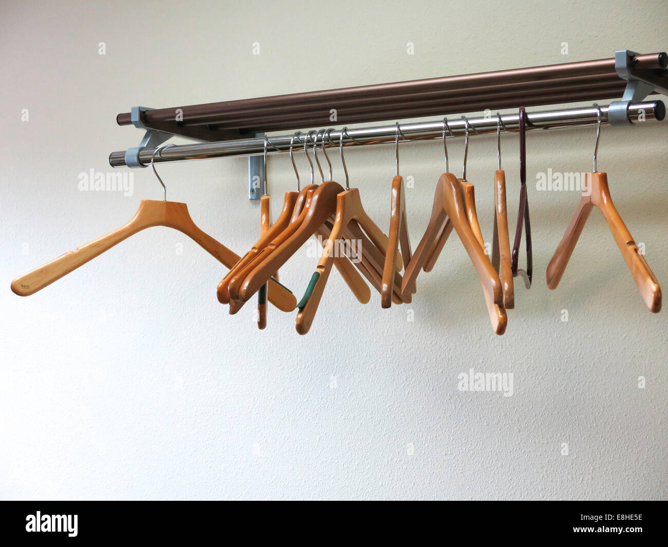 Coat Rack with Empty Clothes Hangers Stock Photo - Alamy