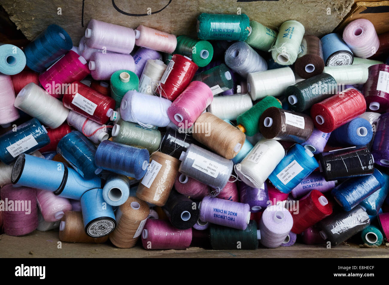 Rolls of thread for sale at East Street Market, London Stock Photo - Alamy