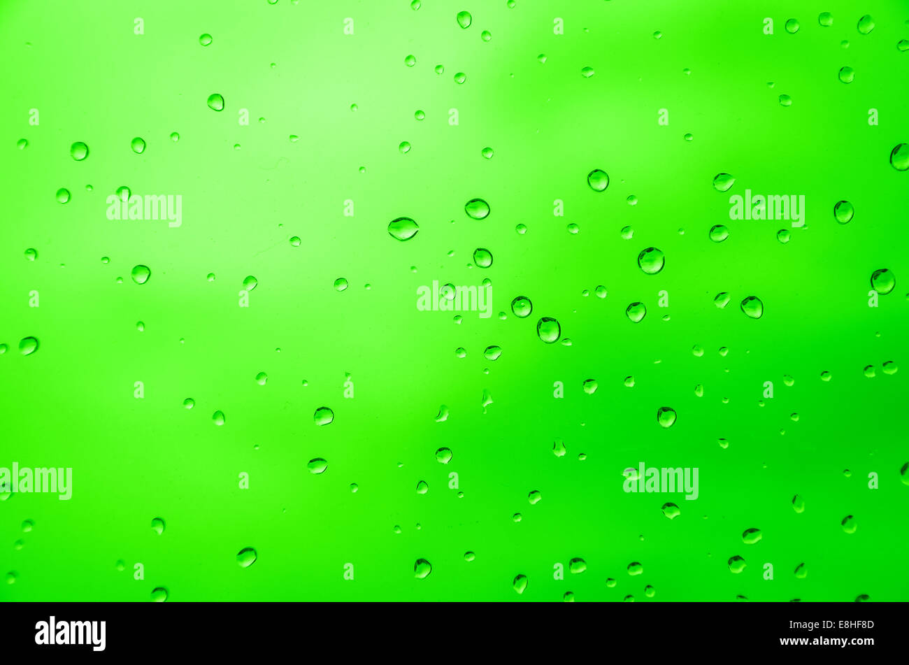 drop water with green background Stock Photo - Alamy