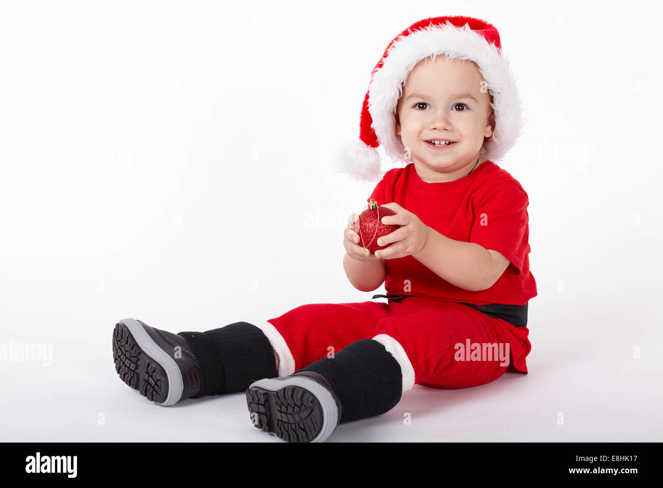 little cute boy with Santa hat Stock Photo - Alamy
