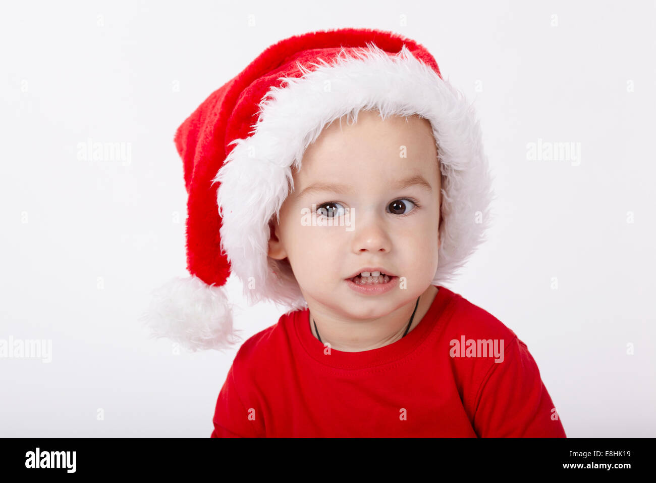 little cute boy with Santa hat Stock Photo - Alamy