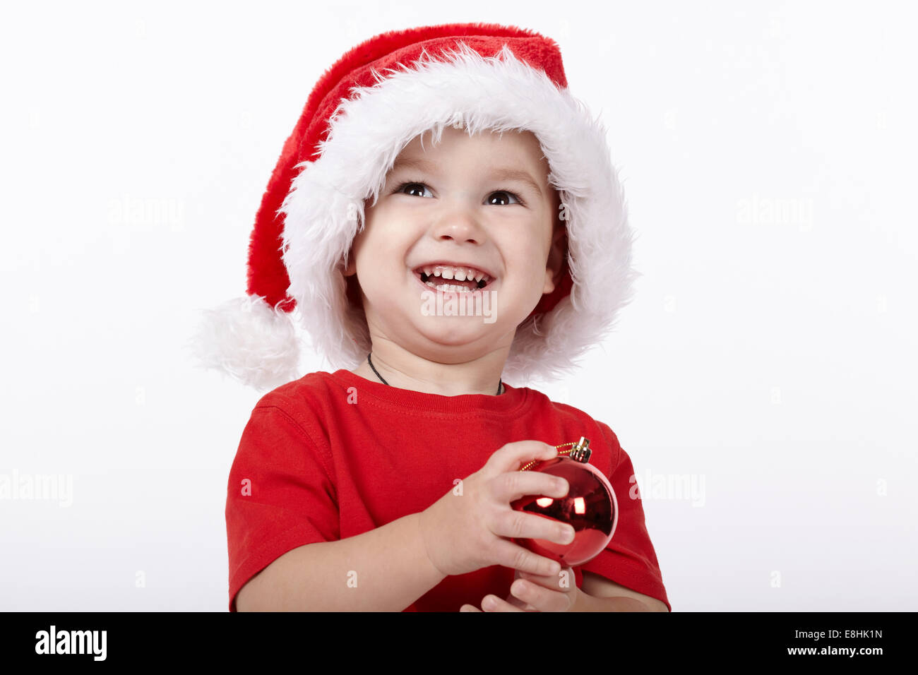 little cute boy with Santa hat Stock Photo - Alamy