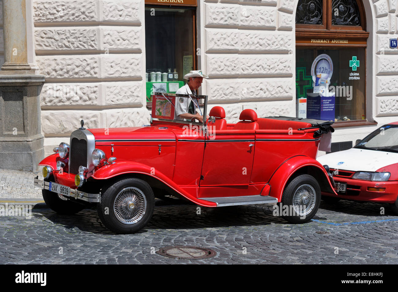 A customized convertible red car on the street of City of Prague, Czech ...