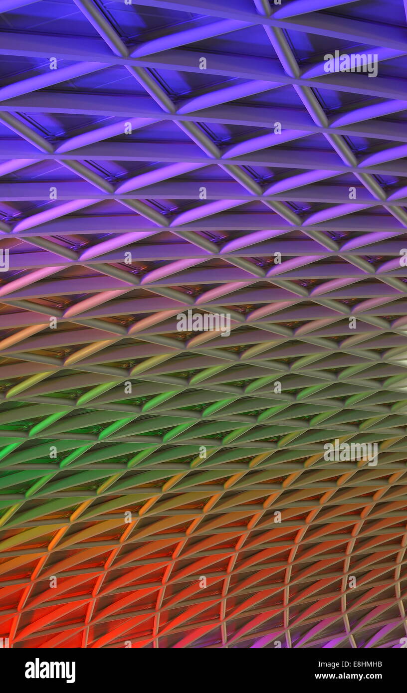 The multi-coloured arched steel ceiling of King's Cross Station in ...