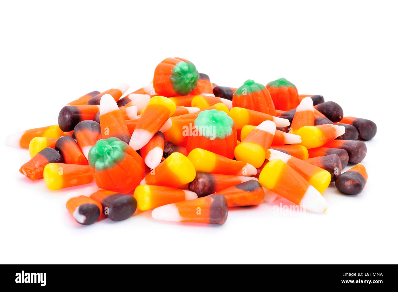 a pile of different Halloween candies on a white background Stock Photo ...