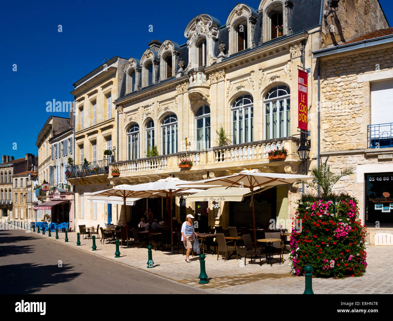 Traditional old buildings in summer in the town centre at Jonzac in the ...