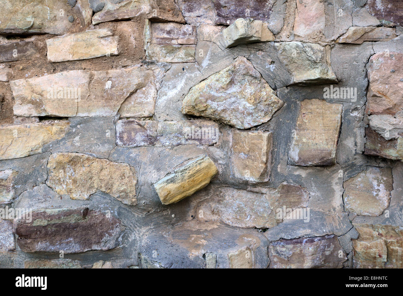 Weathered rock wall texture Stock Photo - Alamy