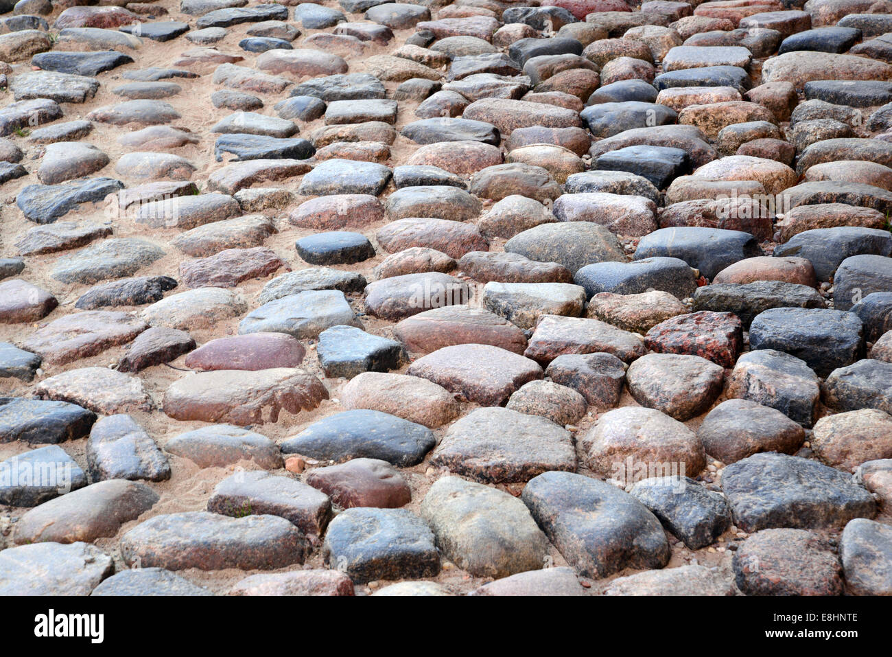 Boulder road texture Stock Photo - Alamy