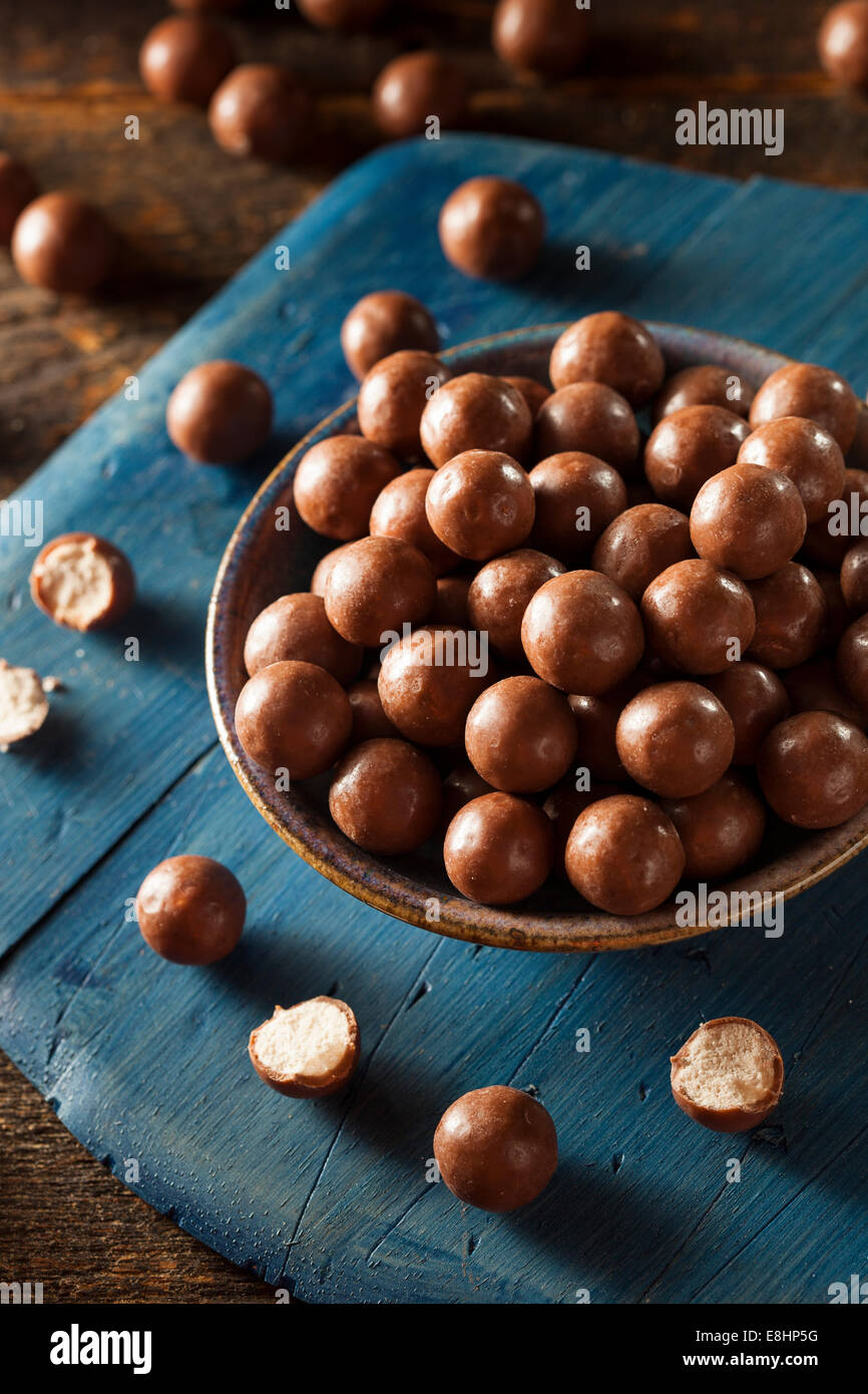 Dark Chocolate Malted Milk Balls in a Bowl Stock Photo - Alamy