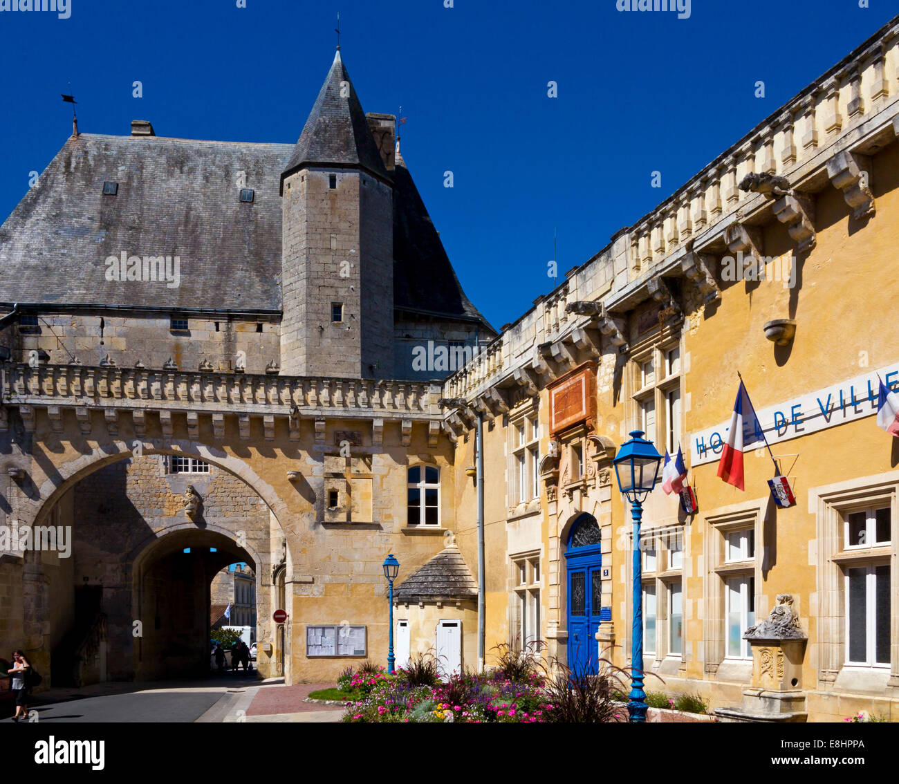 Traditional old buildings in summer in the town centre at Jonzac in the ...