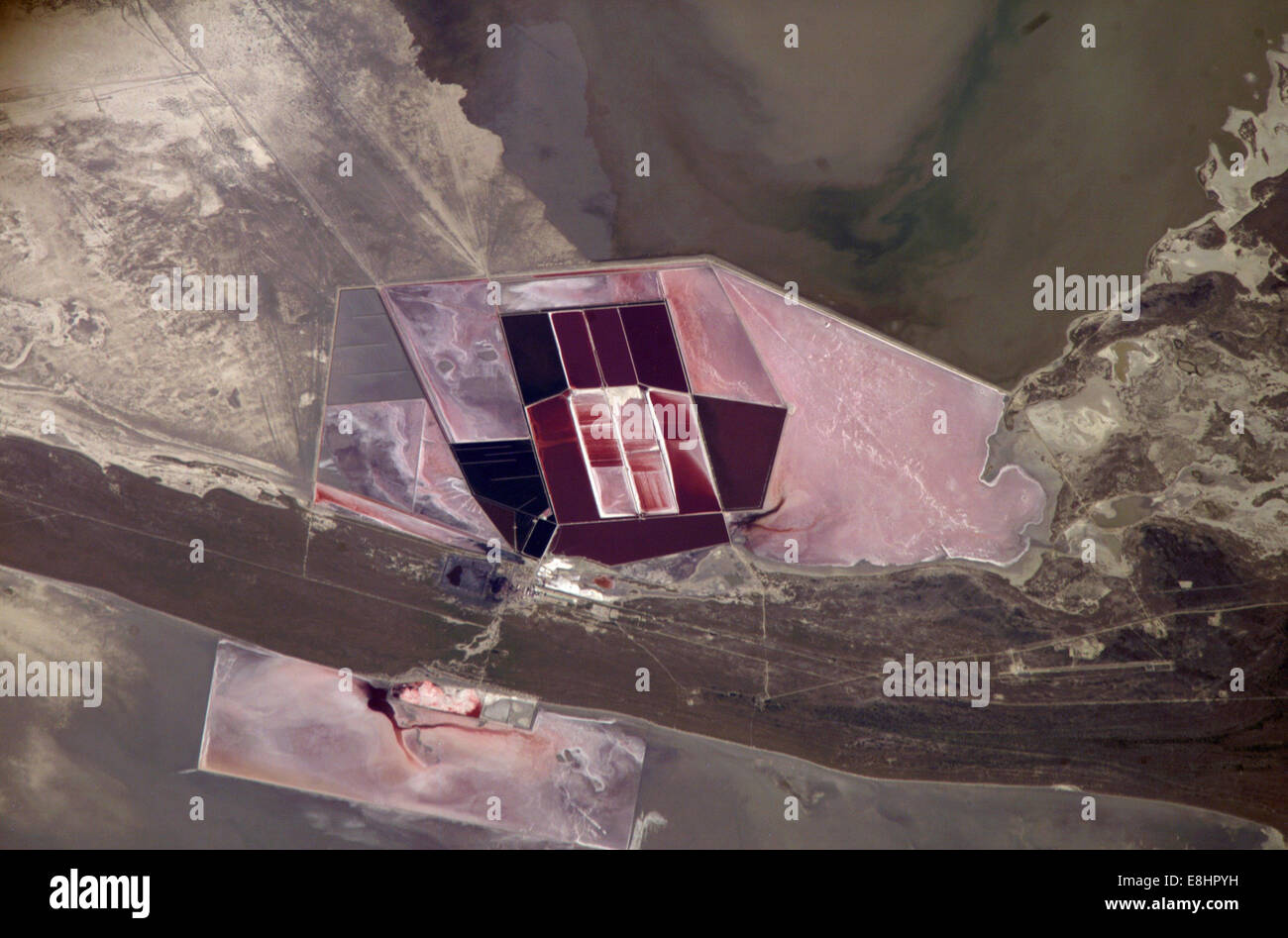 A satellite image showcases the salt ponds of Botswana, revealing their ...