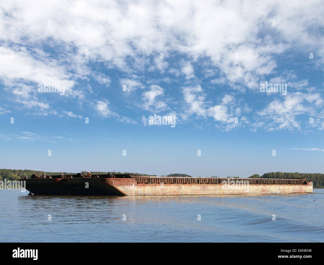 Big cargo barge is anchored on the Danube river in Ruse port Stock ...