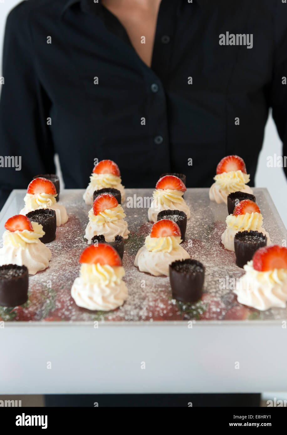 Canapes being served by a waitress at a catered for function Stock ...