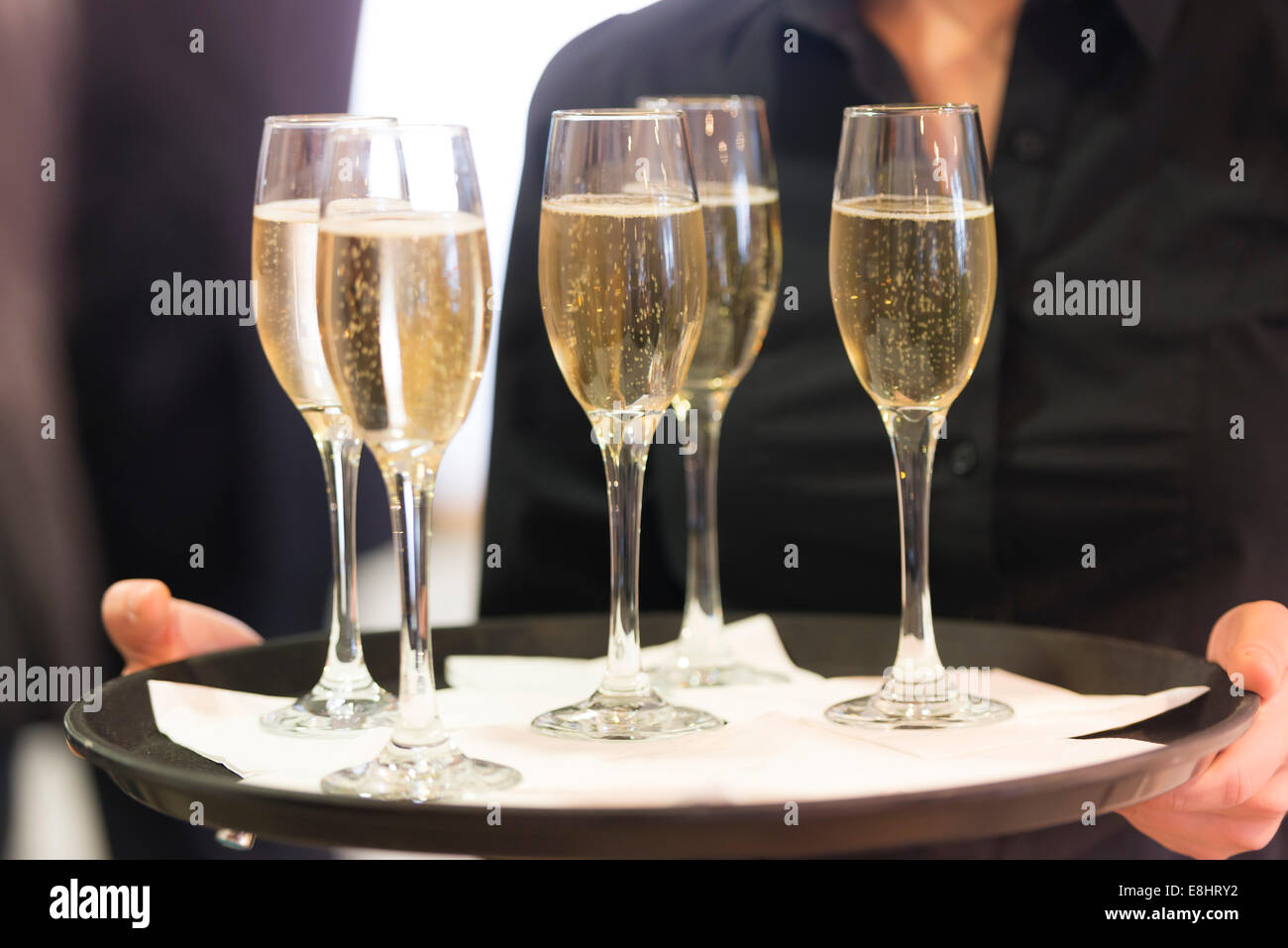 Waitress holding serving tray hi-res stock photography and images - Alamy