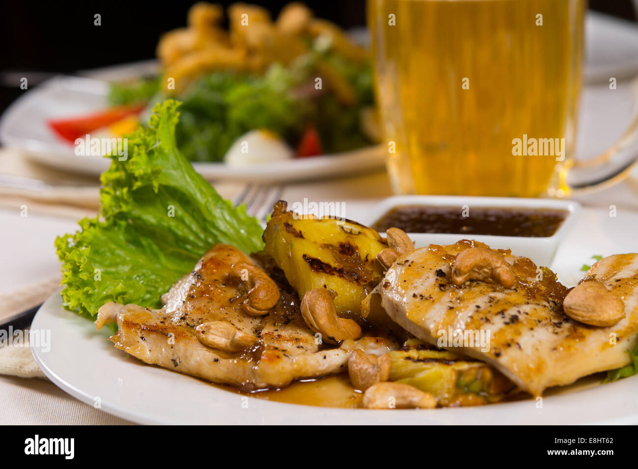 Close up Gourmet Juicy Chicken Meat Main Dish with Hot Dip Sauce and ...