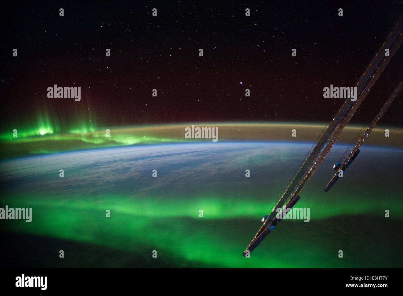 The aurora borealis, a natural light display in Earth's sky, is visible ...