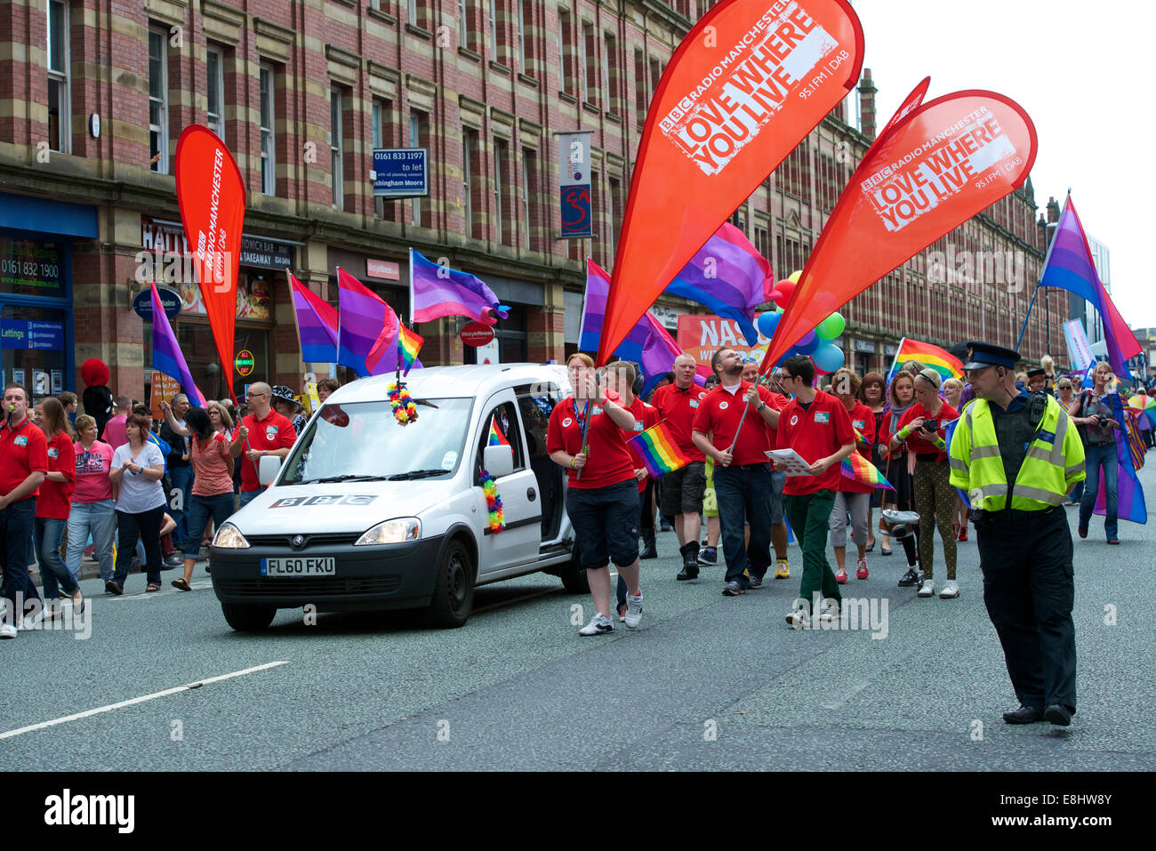 Rainbow flags at manchester pride parade hi-res stock photography and ...