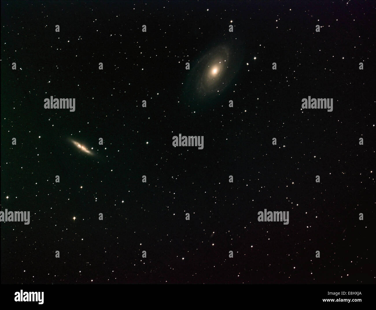 The image captures distant galaxies shining brightly in the night sky ...