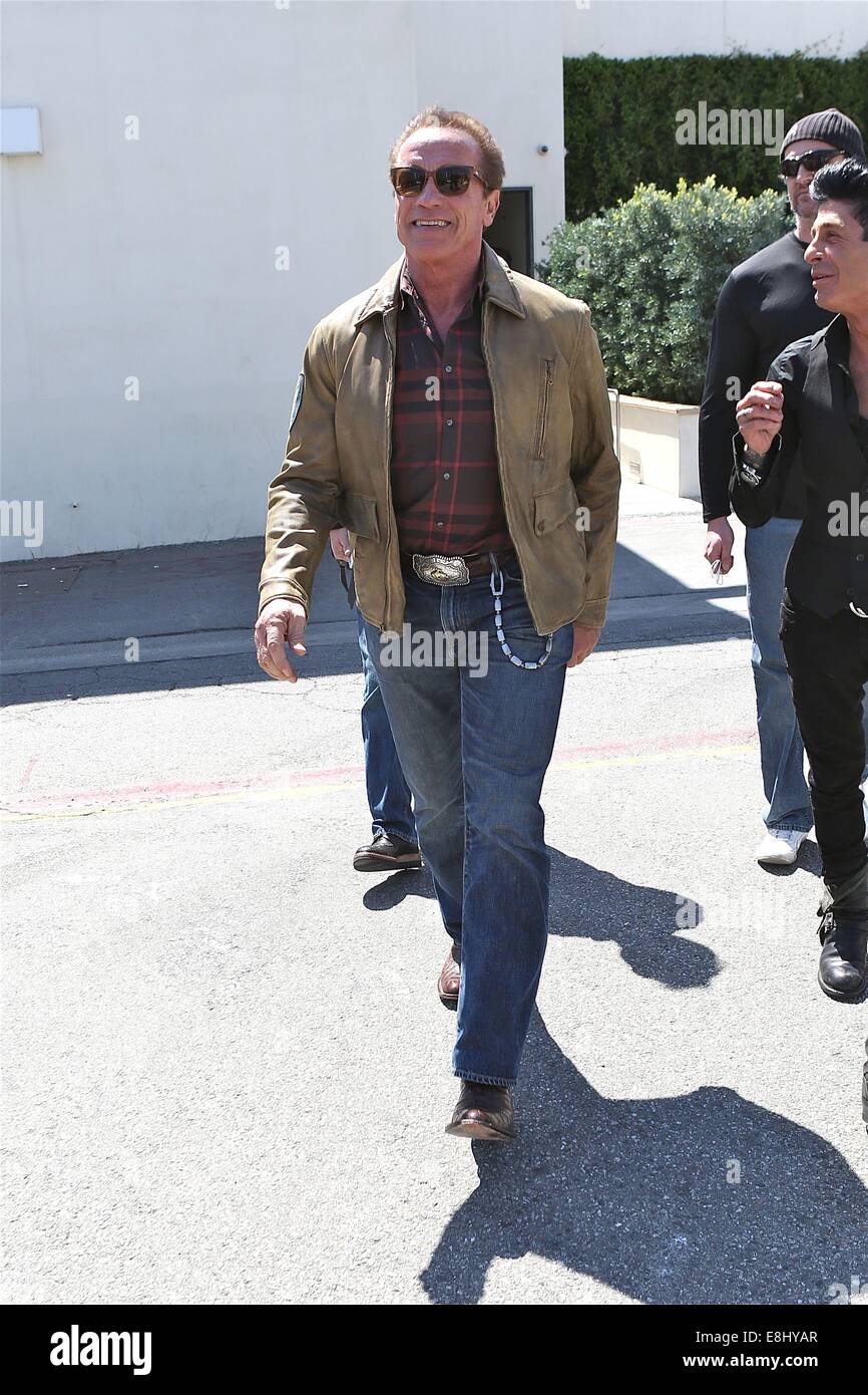 Arnold Schwarzenegger smiles, makes young lady smile Featuring: Arnold ...