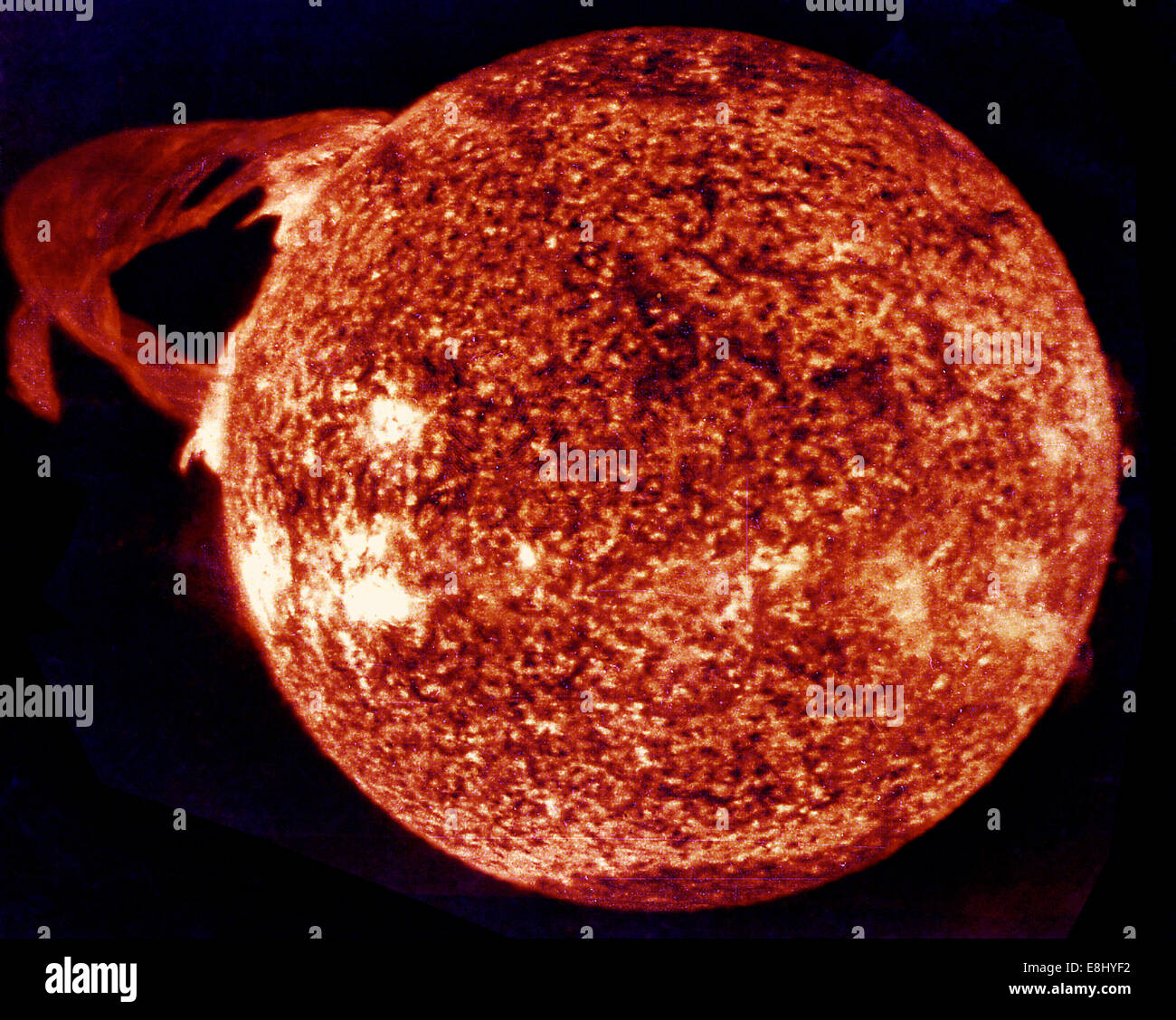 A false-color image shows a solar eruption captured in the light of ...