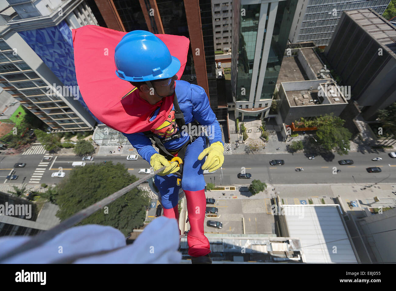 Sao Paulo, Brazil. 8th Oct, 2014. A window cleaner disguised as ...