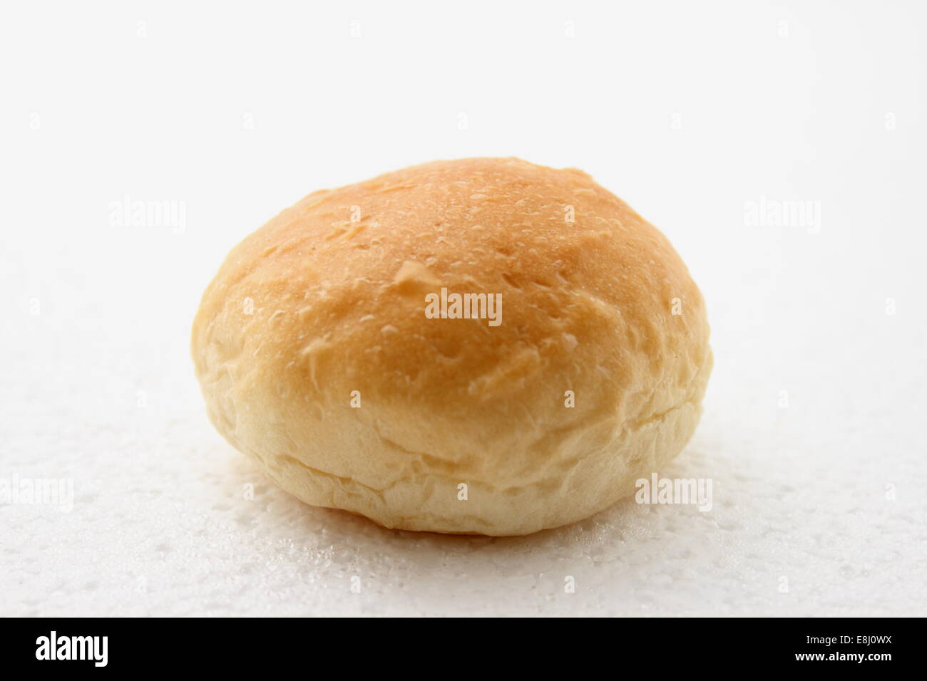 Soft white bread roll on white background Stock Photo - Alamy