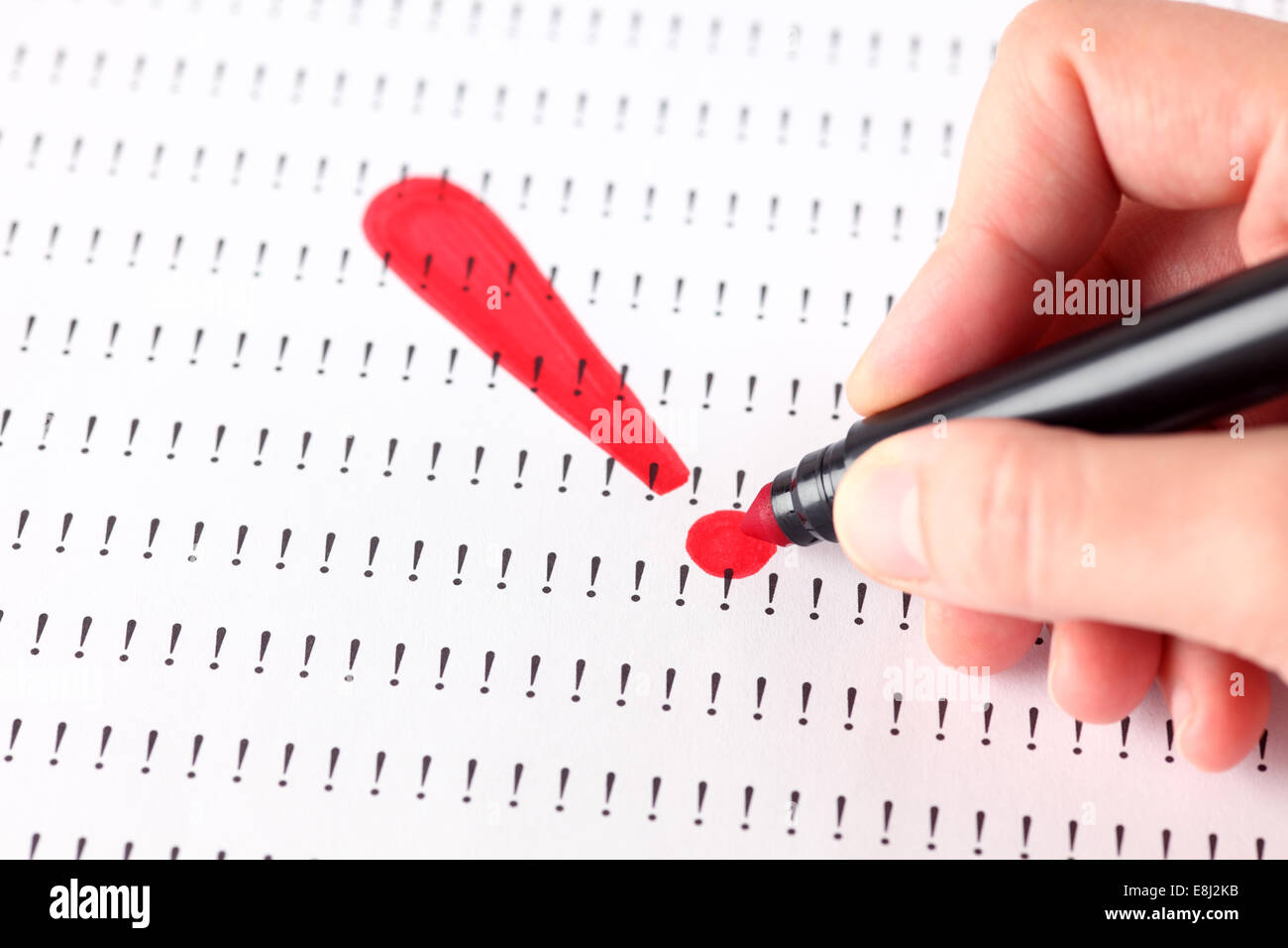 Woman's hand with red pen writing Exclamation mark Stock Photo - Alamy
