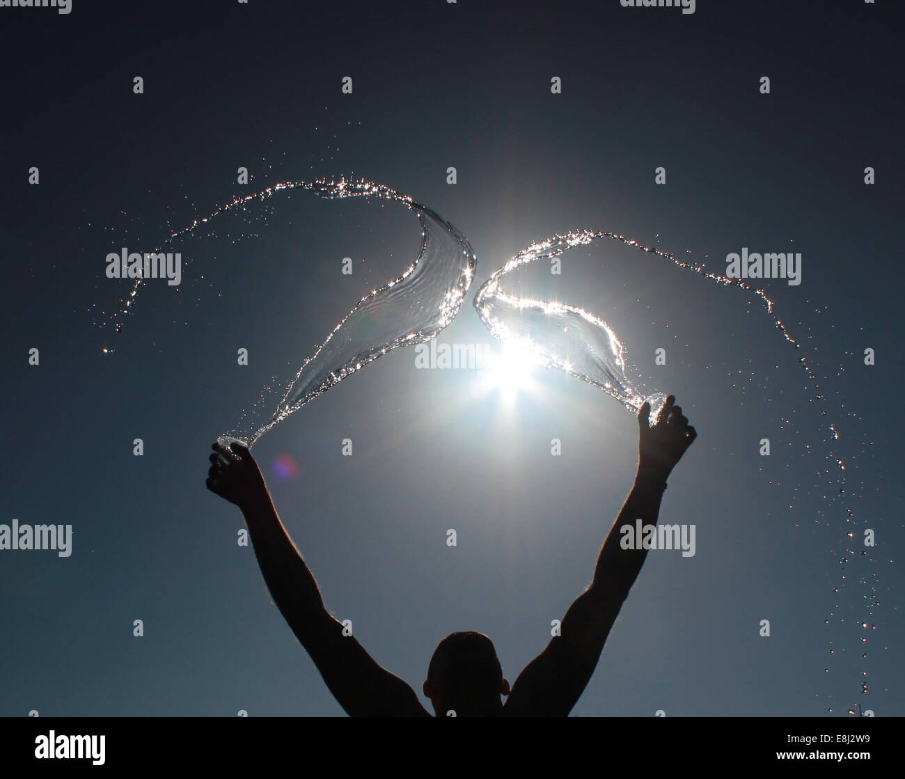 Man throwing water hi-res stock photography and images - Alamy