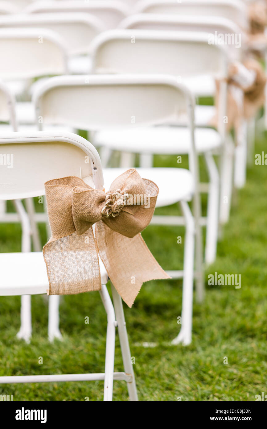 Empty white chairs before wedding ceremony Stock Photo - Alamy
